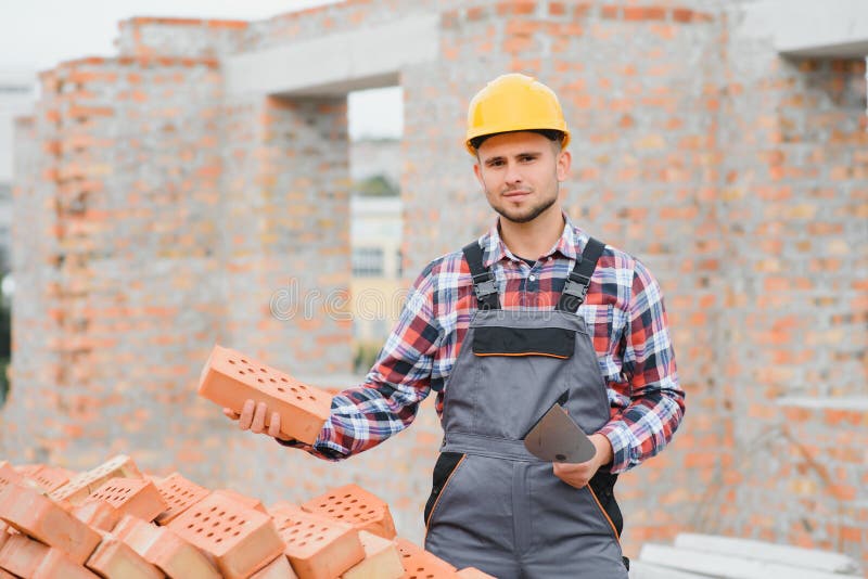 Construction Mason Worker Bricklayer Installing Red Brick with Trowel ...