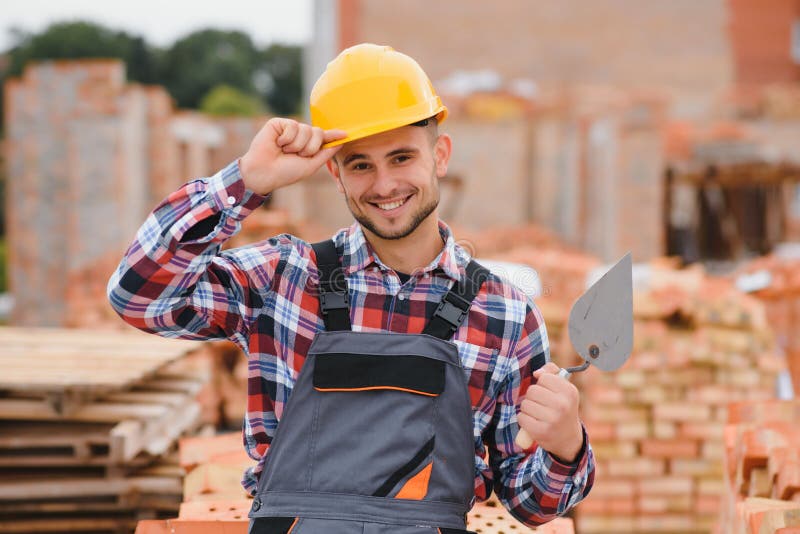Construction Mason Worker Bricklayer Installing Red Brick with Trowel ...