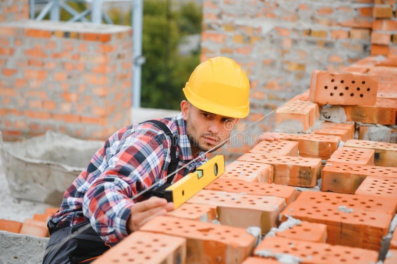 Construction Mason Worker Bricklayer Installing Red Brick with Trowel ...