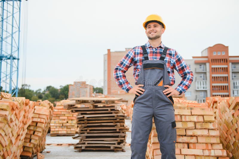 Construction Mason Worker Bricklayer Installing Red Brick with Trowel ...