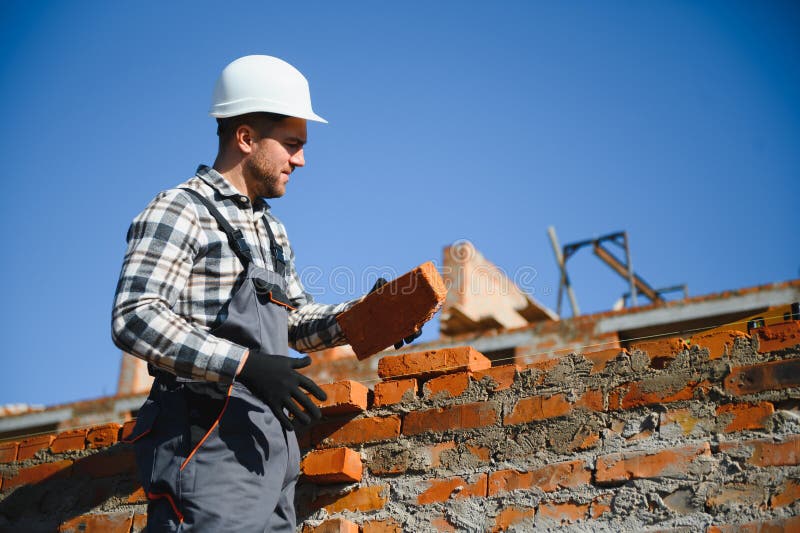 Construction Mason Worker Bricklayer Installing Red Brick with Trowel ...