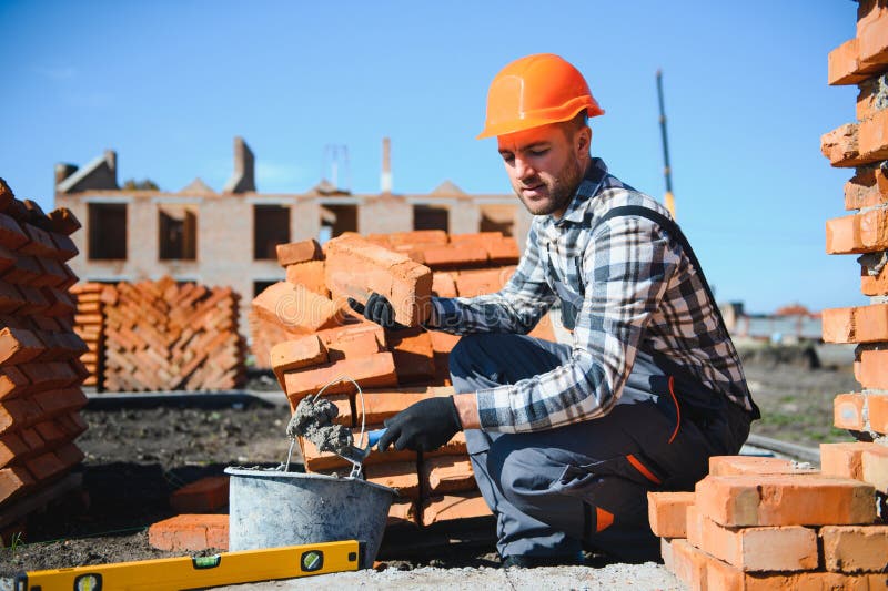 Construction Mason Worker Bricklayer Installing Red Brick with Trowel ...