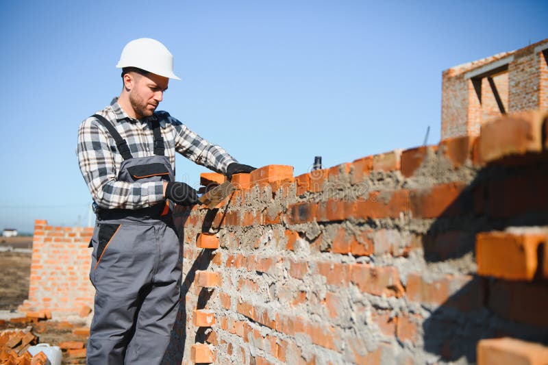 Construction Mason Worker Bricklayer Installing Red Brick with Trowel ...
