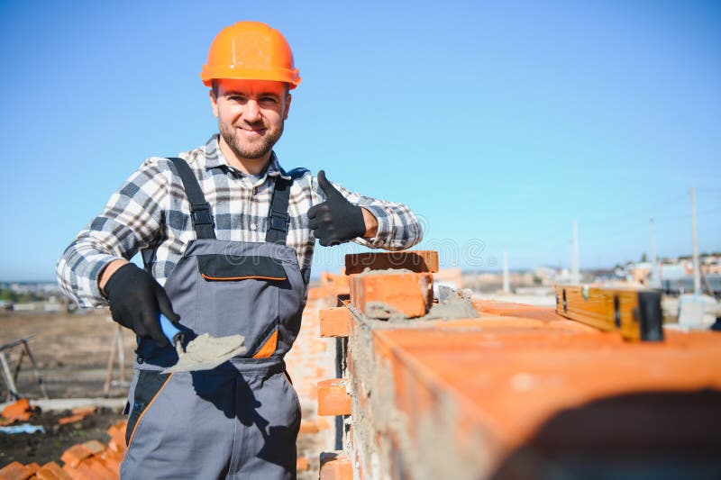 Construction Mason Worker Bricklayer Installing Red Brick with Trowel ...
