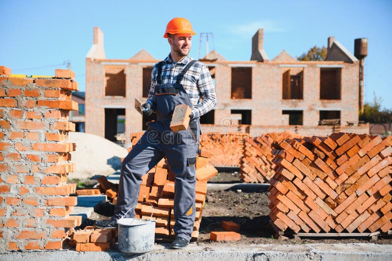 Construction Mason Worker Bricklayer Installing Red Brick with Trowel ...
