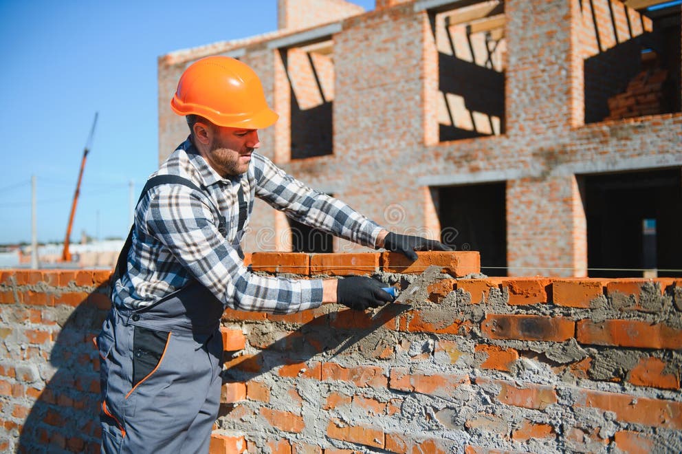 Construction Mason Worker Bricklayer Installing Red Brick with Trowel ...