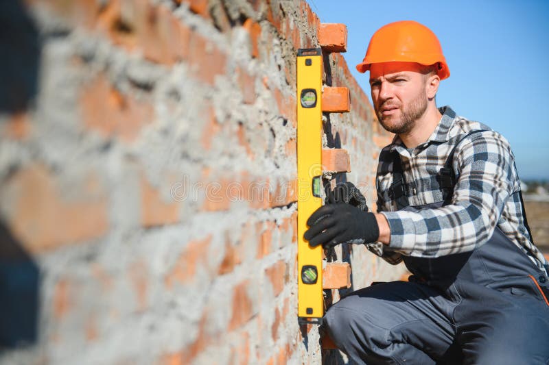 Construction Mason Worker Bricklayer Installing Red Brick with Trowel ...