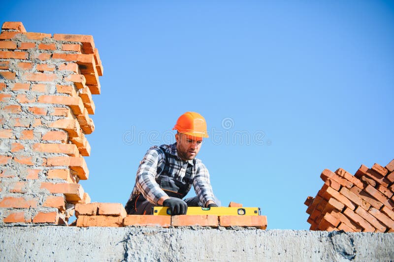 Construction Mason Worker Bricklayer Installing Red Brick with Trowel ...