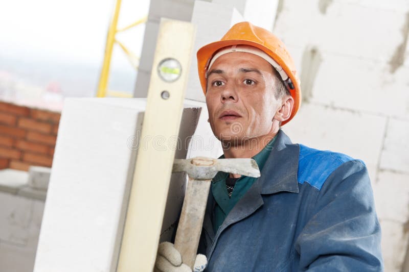 Construction Mason Worker Bricklayer with Level Stock Photo - Image of ...