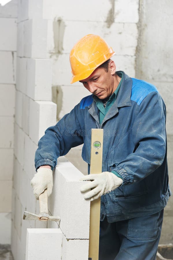 Construction Mason Worker Bricklayer with Level Stock Photo - Image of ...