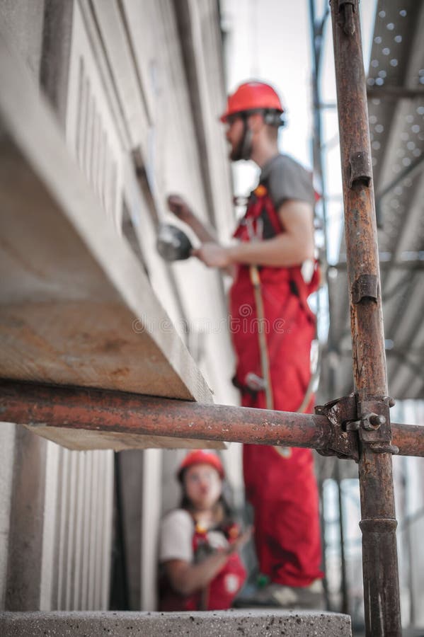 Construction Mason Worker Plastering Old Building Wall Using Cement ...