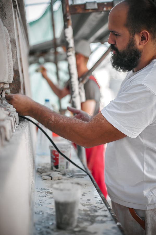 Construction Mason Worker Mixing Cement and Sand with Spatula Stock ...