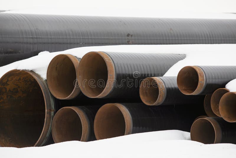 Construction Materials. Plastic Industrial Pipes Under Snow Stock Image ...