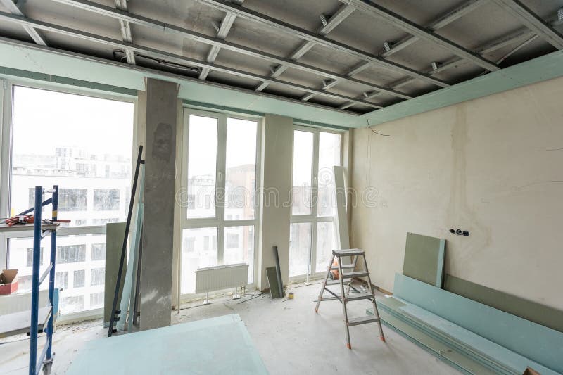 Construction Materials and Sheets of Plasterboard or Drywall are Prepared for Working Process of ...