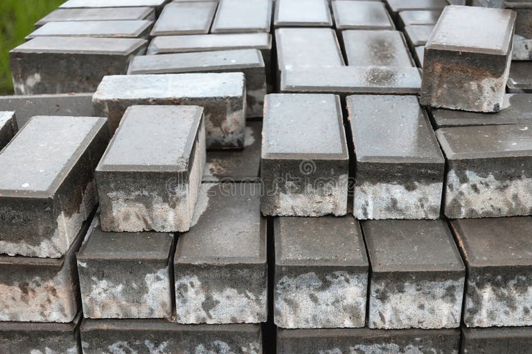 Construction Materials Stacked at a Building Site with Concrete Bricks ...