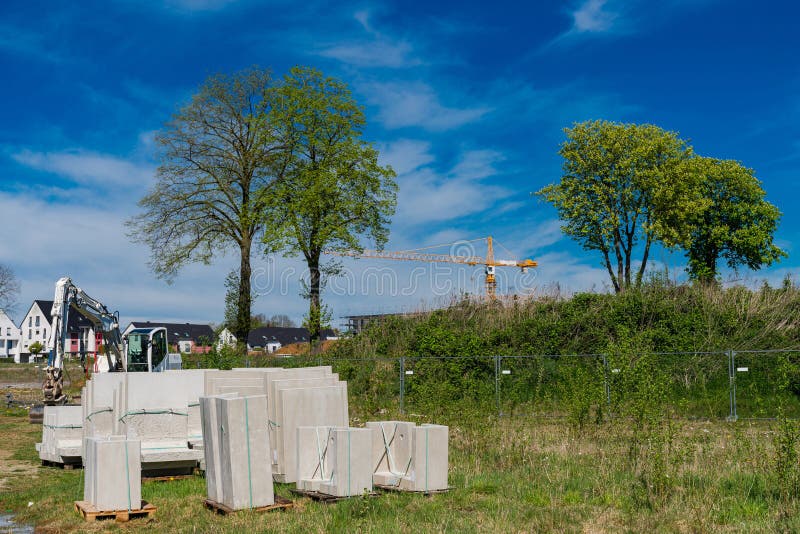 Construction Site with Materials Under Blue Sky in Springtime Editorial ...