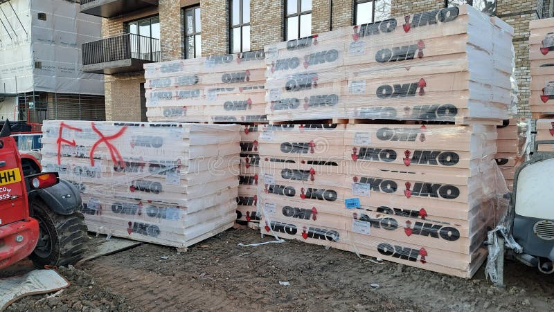 Construction Materials Stored on the Roof of Construction Building ...
