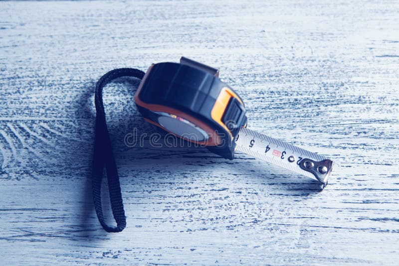 Construction Measuring Tape on the Table Stock Image - Image of measure ...