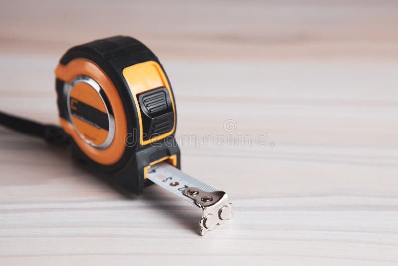 Construction Measuring Tape on the Table Stock Photo - Image of table ...