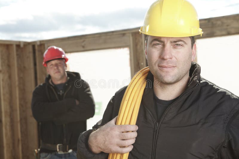 Construction Men Working Outside Stock Photo - Image of cloud, brown ...