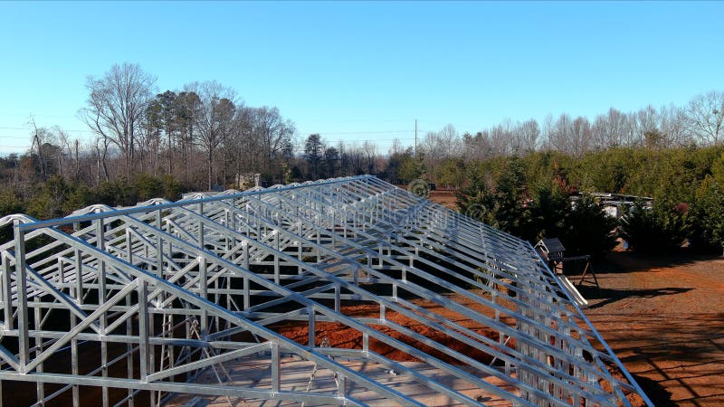 Construction of a Metal Roof Framework in a Rural Area during a Clear ...