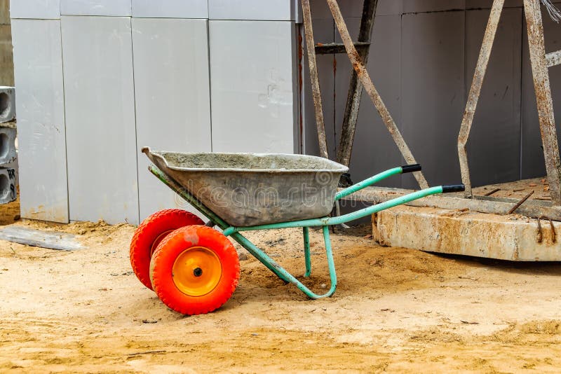 Construction Metal Wheelbarrow or Cart Close-up. Transportation of ...