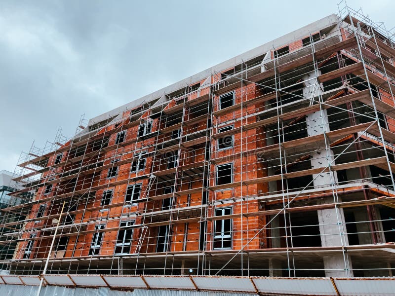 Construction of a Modern Building with Scaffolding at an Urban Site ...