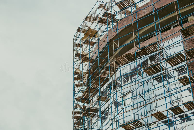 Construction of a Modern House. Glass Facade in Scaffolding Stock Image ...
