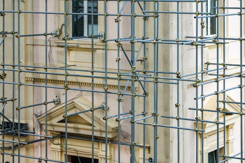 Construction of Modern Metal Pipe Scaffolding Around the Facade of the ...