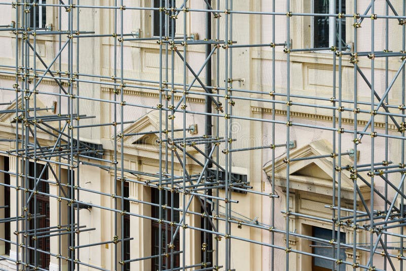 Construction of Modern Metal Pipe Scaffolding Around the Facade of the ...