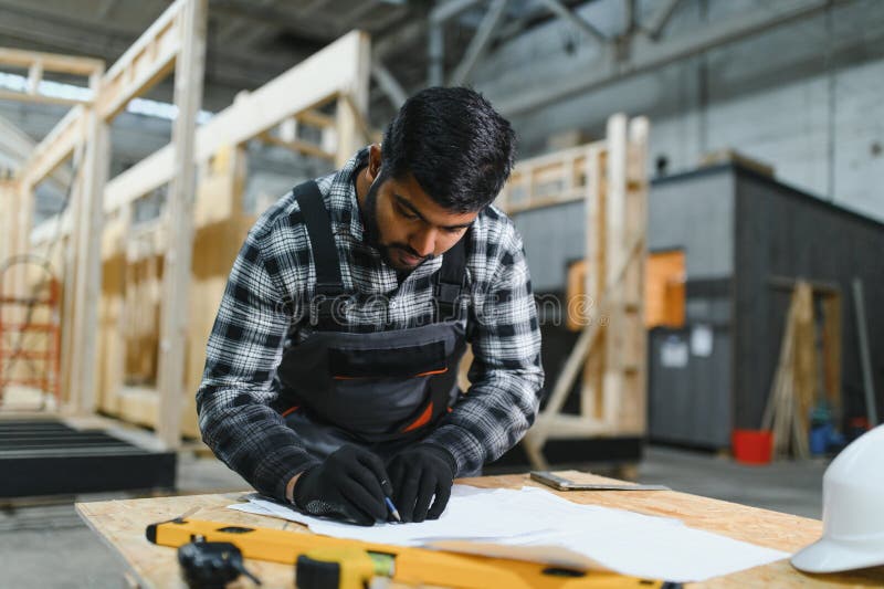 Construction of Modern Modular Houses. Indian Architect Works with ...