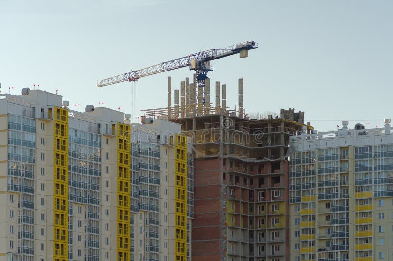 Crane Works at a Construction Site. Horizontal Frame Stock Photo ...