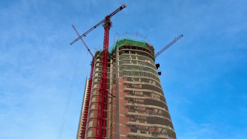 The Construction of Modern Skyscrapers with Cranes is Taking Place ...