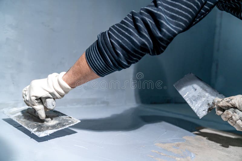 Construction Modifications of the Floor and Walls with Trowel of a Room ...