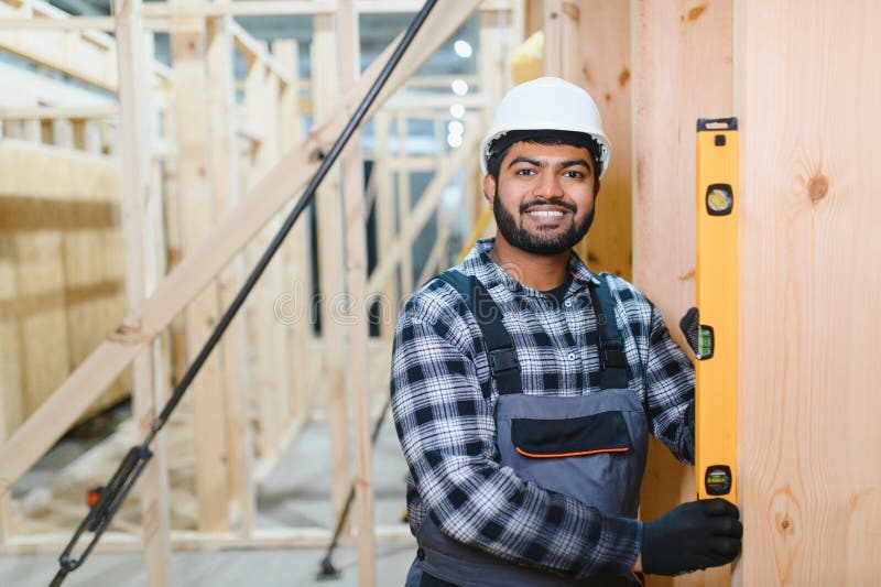 Construction of Modular Houses. Indian Construction Worker or Engineer ...
