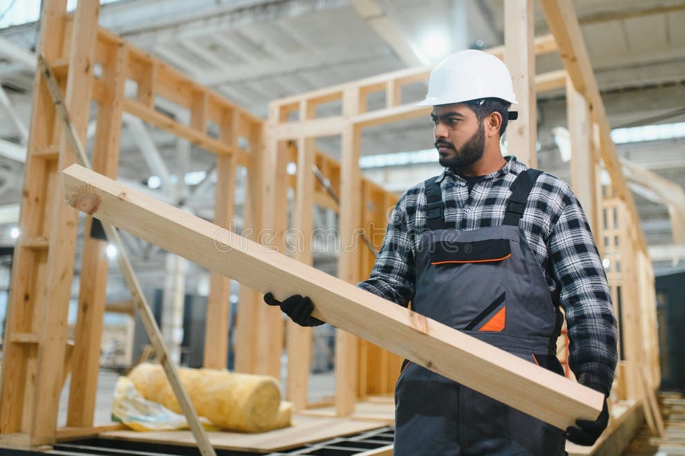 Construction of Modular Houses. Indian Construction Worker or Engineer ...