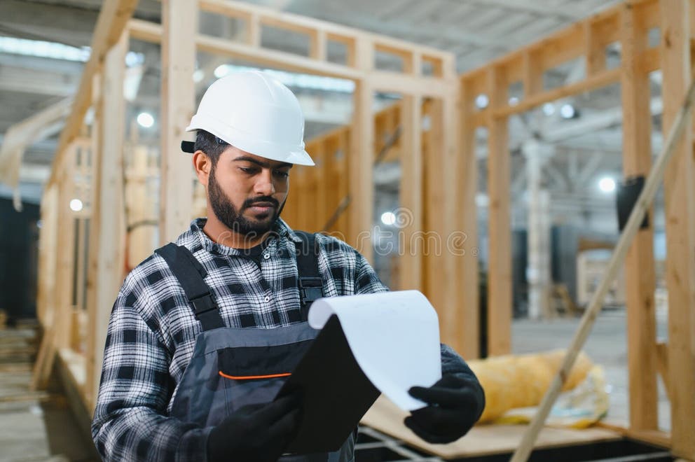 Construction of Modular Houses. Indian Construction Worker or Engineer ...