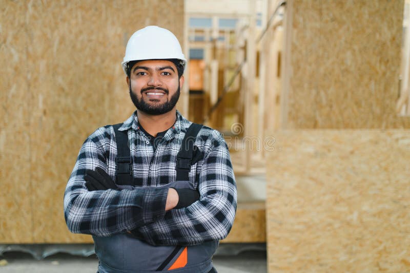 Construction of Modular Houses. Indian Construction Worker or Engineer ...