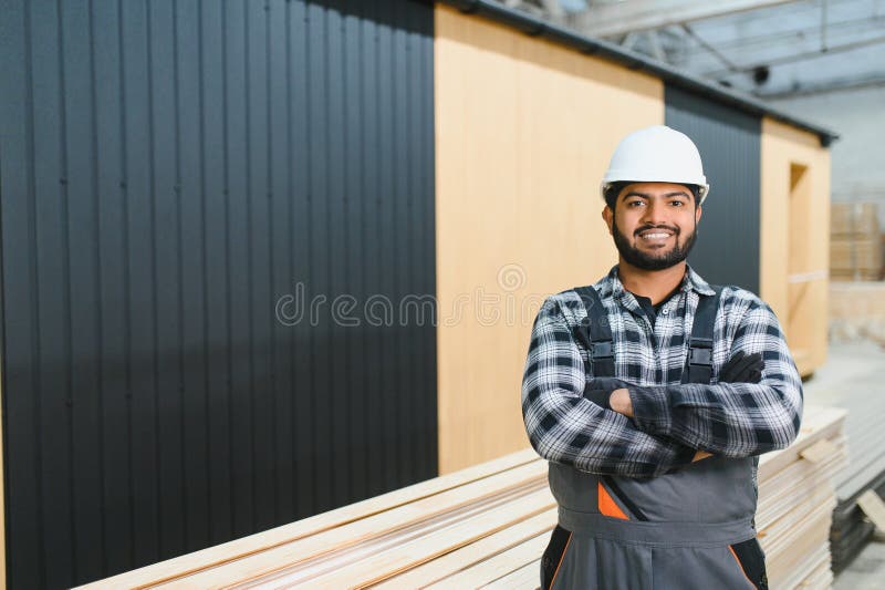 Construction of Modular Houses. Indian Construction Worker or Engineer ...