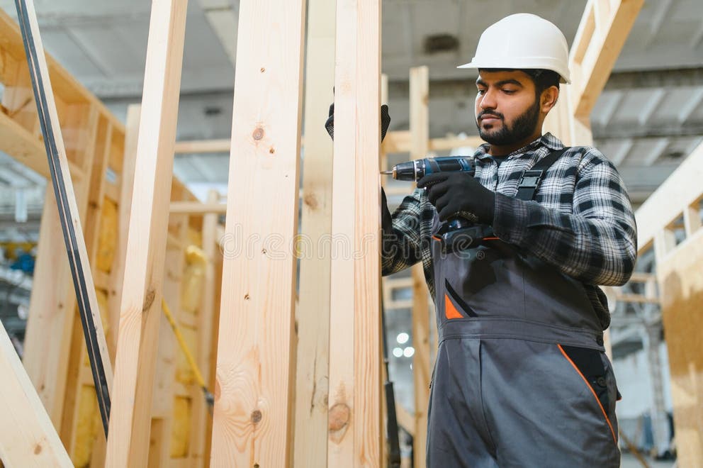 Construction of Modular Houses. Indian Construction Worker or Engineer ...