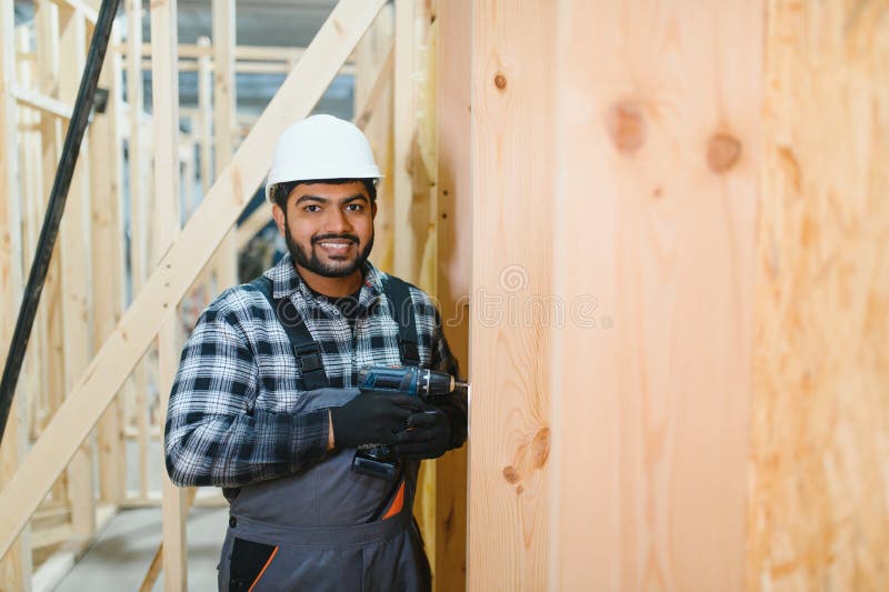 Construction of Modular Houses. Indian Construction Worker or Engineer ...