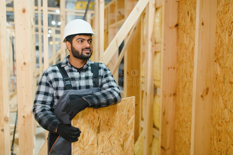 Construction of Modular Houses. Indian Construction Worker or Engineer ...