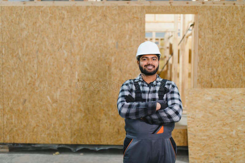 Construction of Modular Houses. Indian Construction Worker or Engineer ...