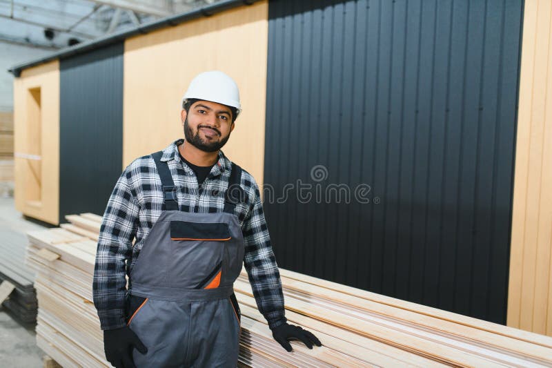 Construction of Modular Houses. Indian Construction Worker or Engineer ...