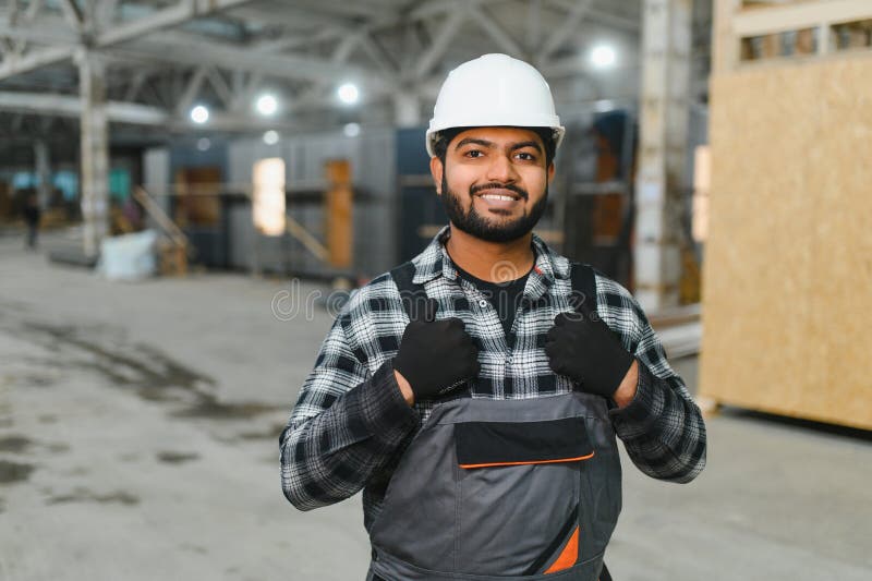 Construction of Modular Houses. Indian Construction Worker or Engineer ...