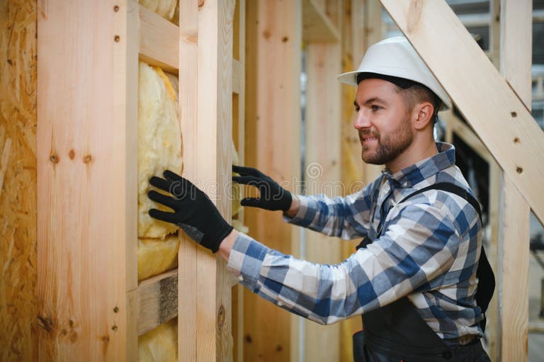 Construction of Modular Houses. Male Construction Worker in Uniform and ...
