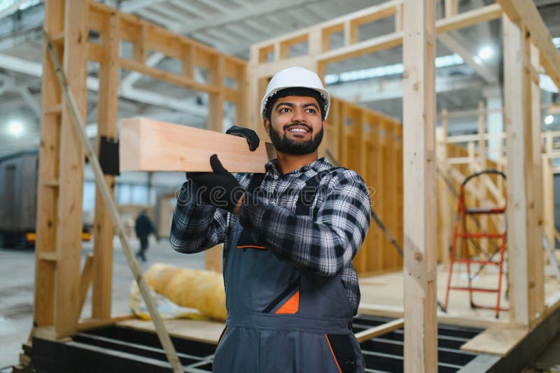 Construction of Modular Houses. Male Indian Construction Worker in ...
