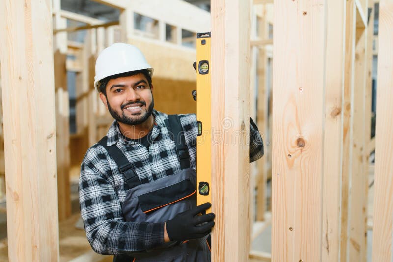 Construction of Modular Houses. Male Indian Construction Worker in ...