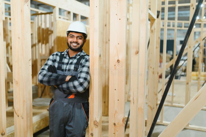 Construction of Modular Houses. Male Indian Construction Worker in ...