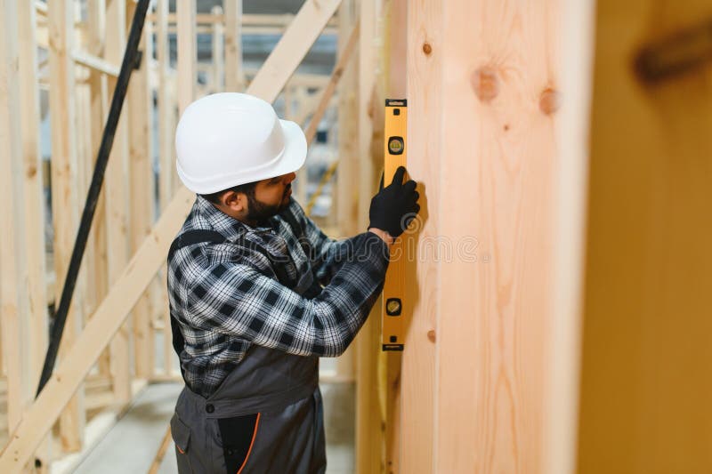 Construction of Modular Houses. Male Indian Construction Worker in ...